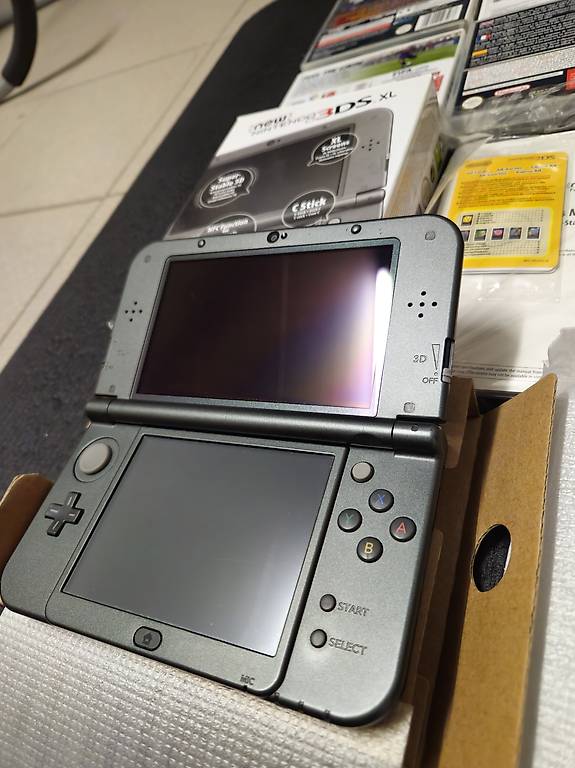New Nintendo 3DS XL + Games im Kanton St. Gallen - tutti.ch